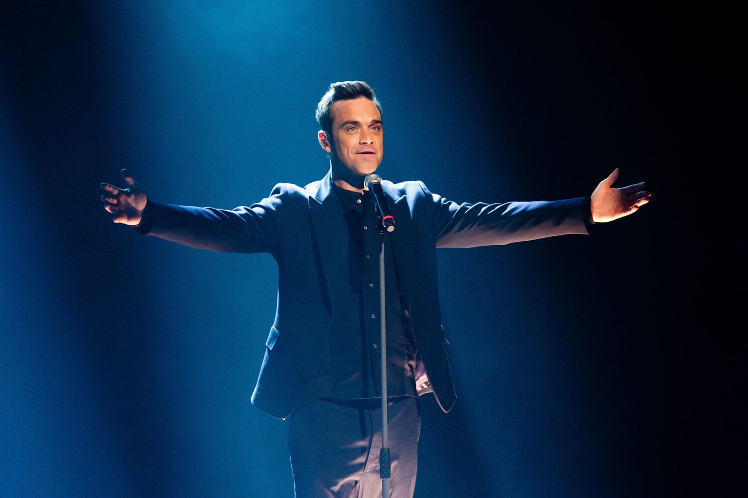 How Robbie Williams is connected to Port Vale as popstar signs shirt ...