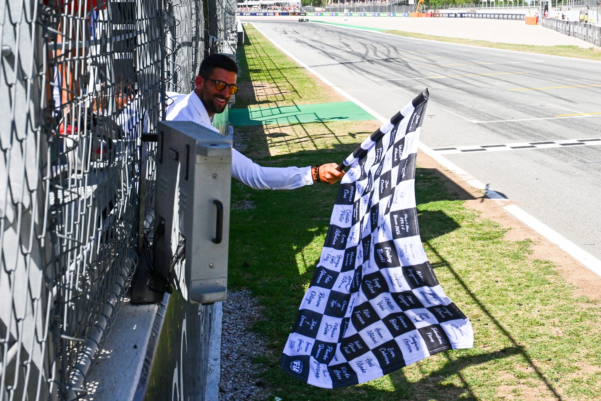 Novak Djokovic denied Barcelona GP entry before waving flag for Lewis ...