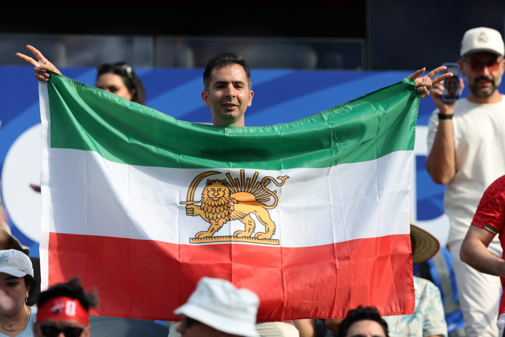 Iran football fans creatively sidestep FIFA's ban on pre-revolutionary ...